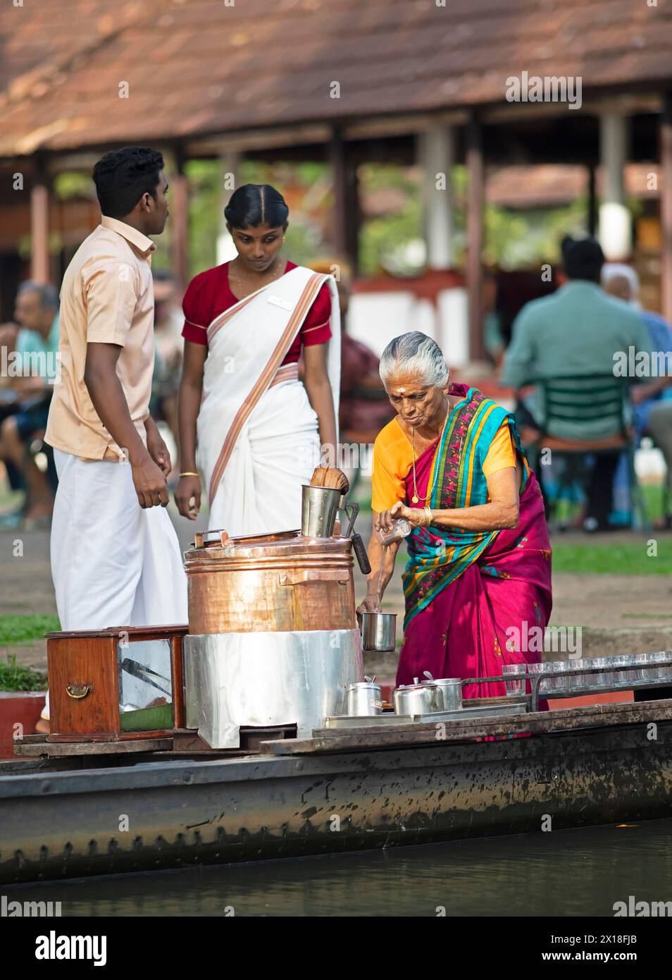 Tealady, 83 years old, making Indian tea on her boat, Backwaters ...