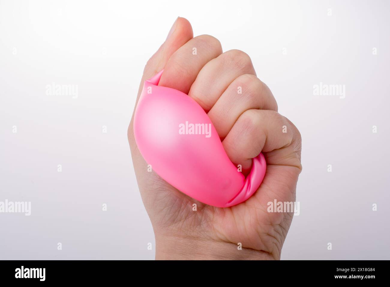 Squeezing balloon hi-res stock photography and images - Alamy
