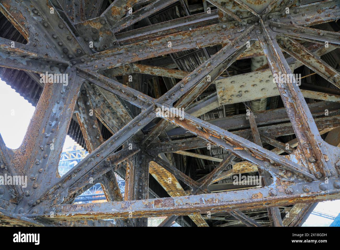 Rusted iron structure of a bridge, Solvay chemical plant for the ...