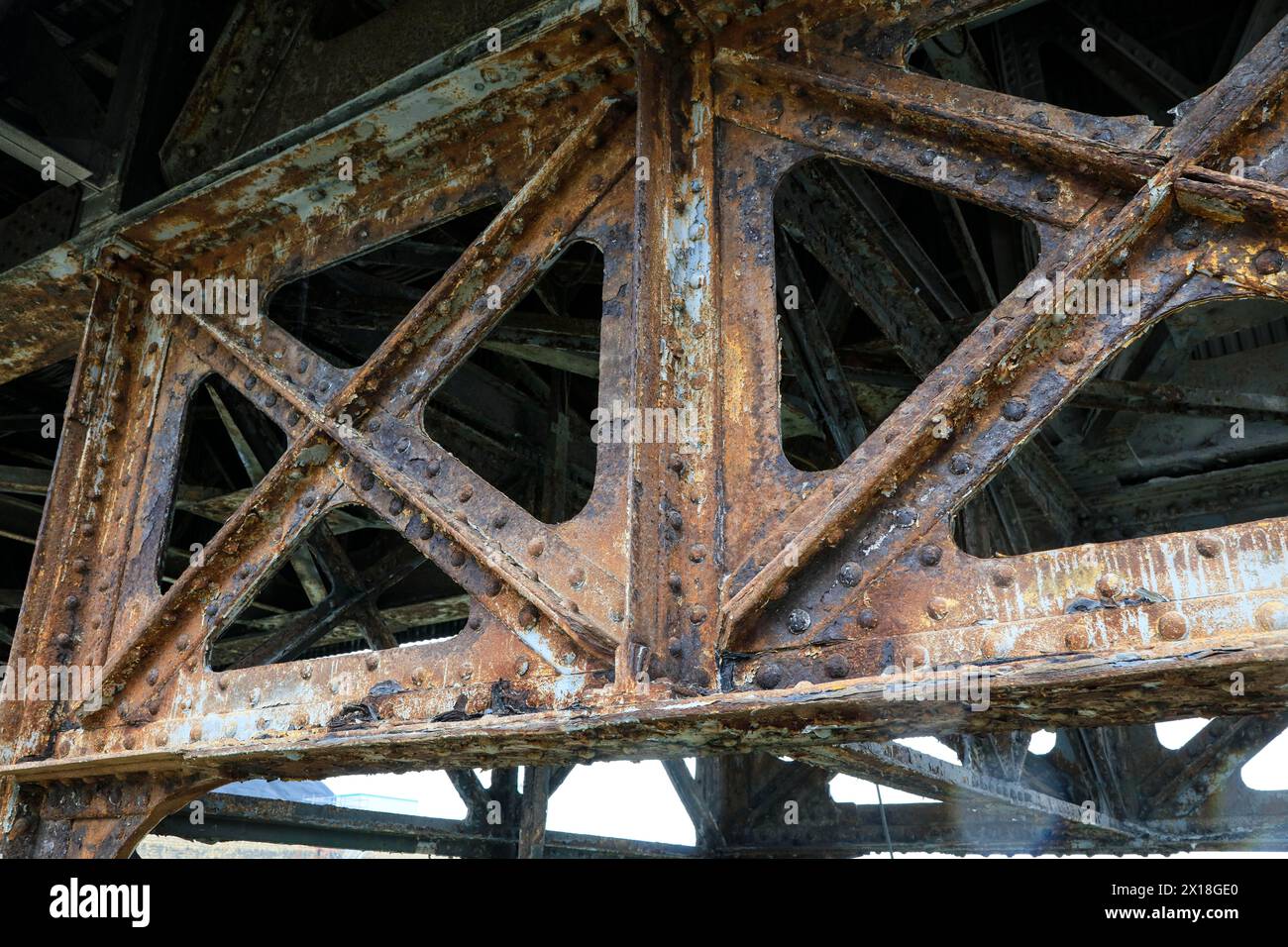 Rusted iron structure of a bridge, Solvay chemical plant for the ...