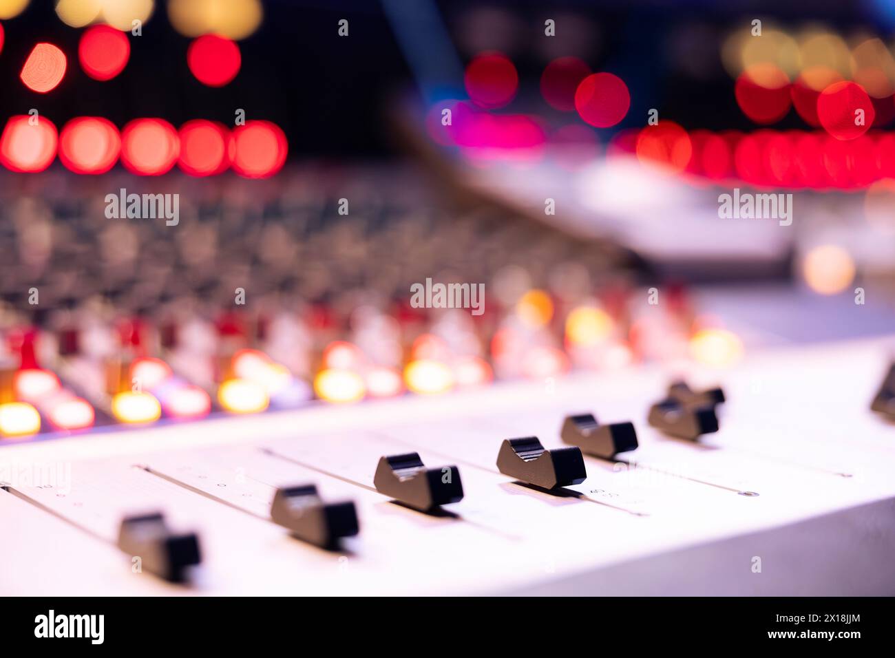 Motorized faders and sliders used in music production industry ...
