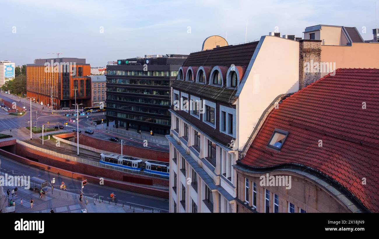 Panorama of old and modern buildings in sunset time in Wroclaw. Blurred ...
