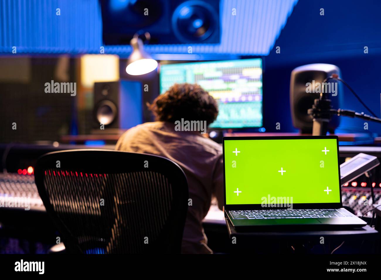 Musician and sound engineer working on a new song with isolated screen ...