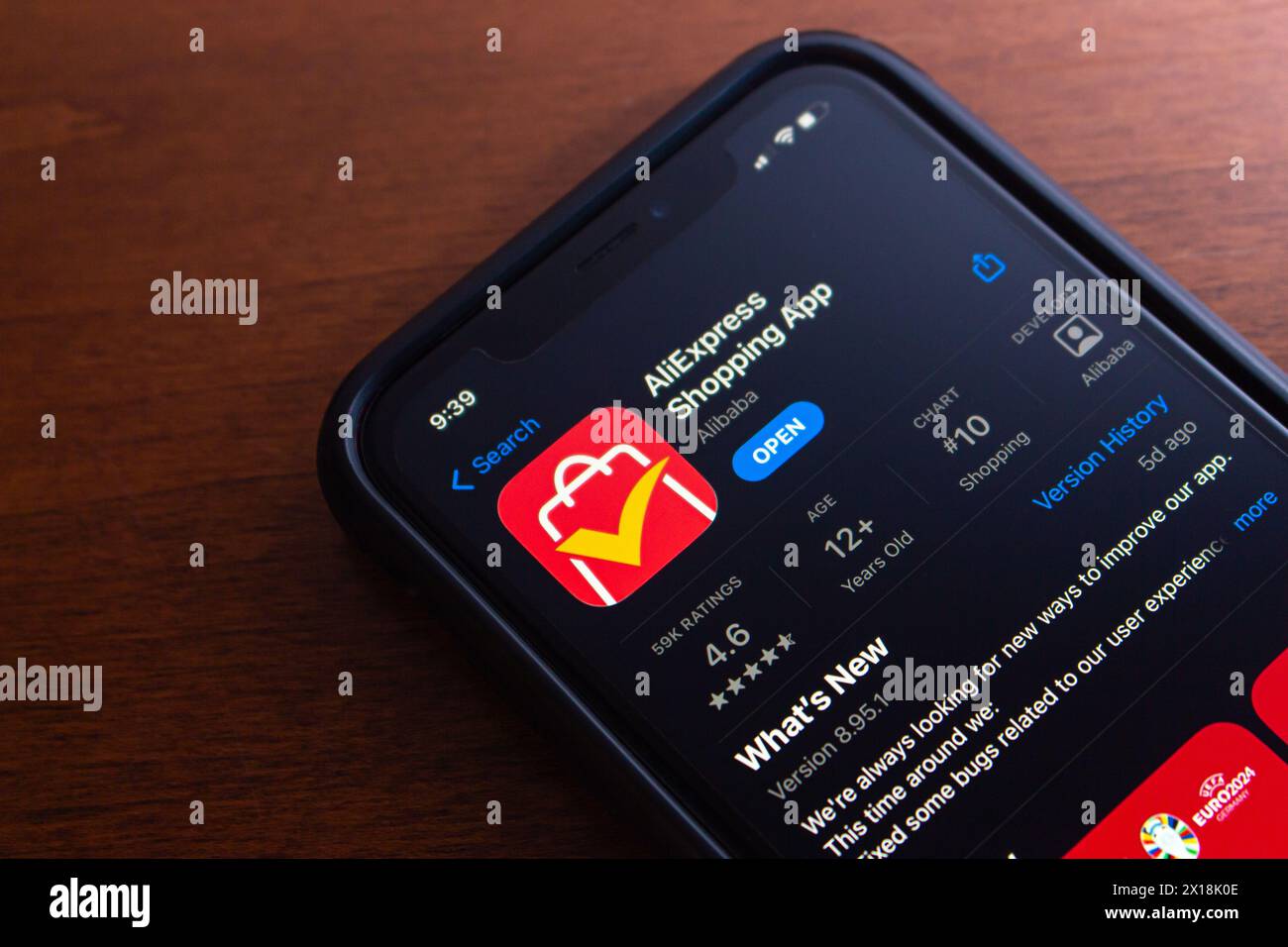 AliExpress app seen in an App Store on an iPhone screen. AliExpress is ...