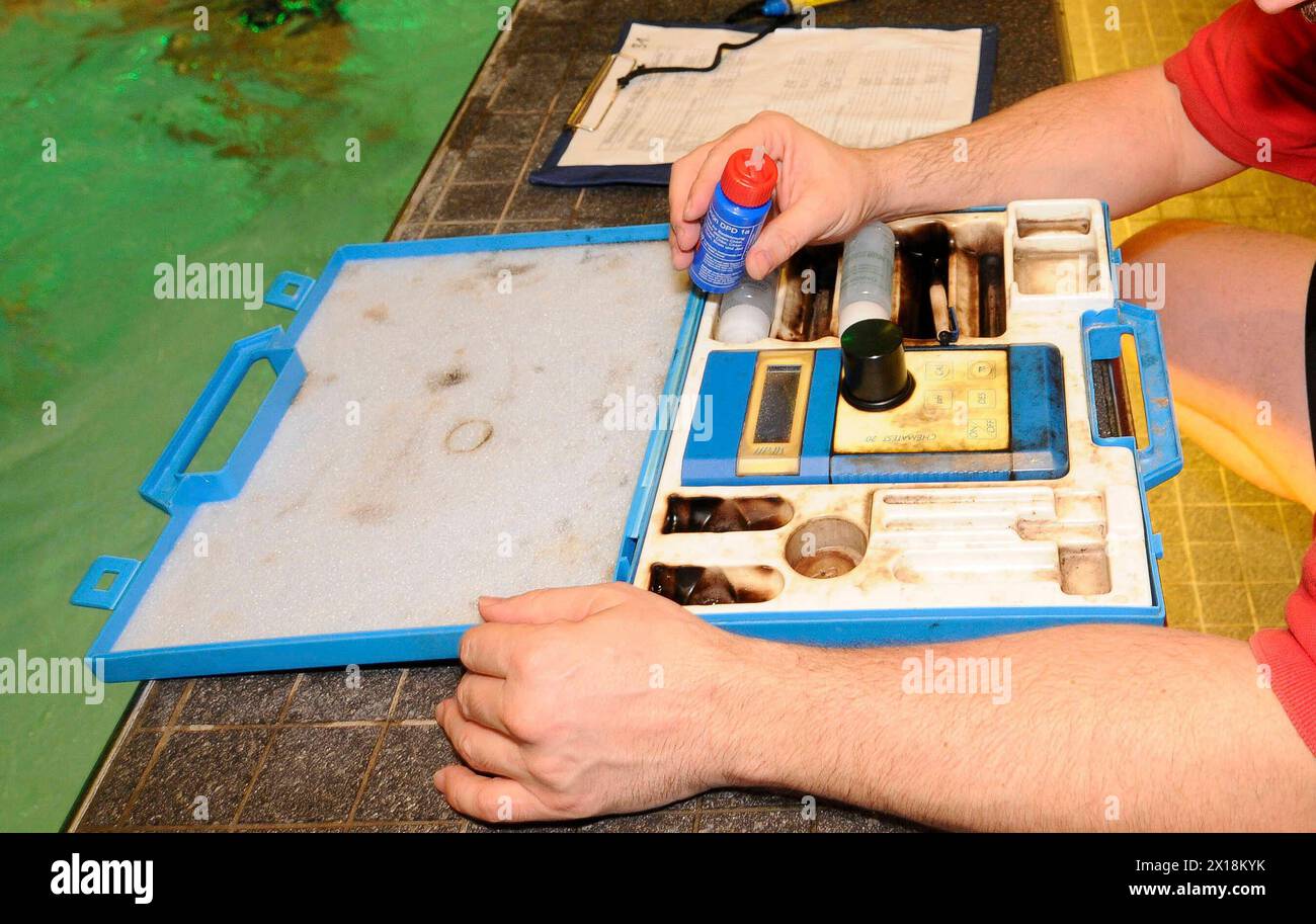 taking a sample to measure and analyse the water quality taking sample ...