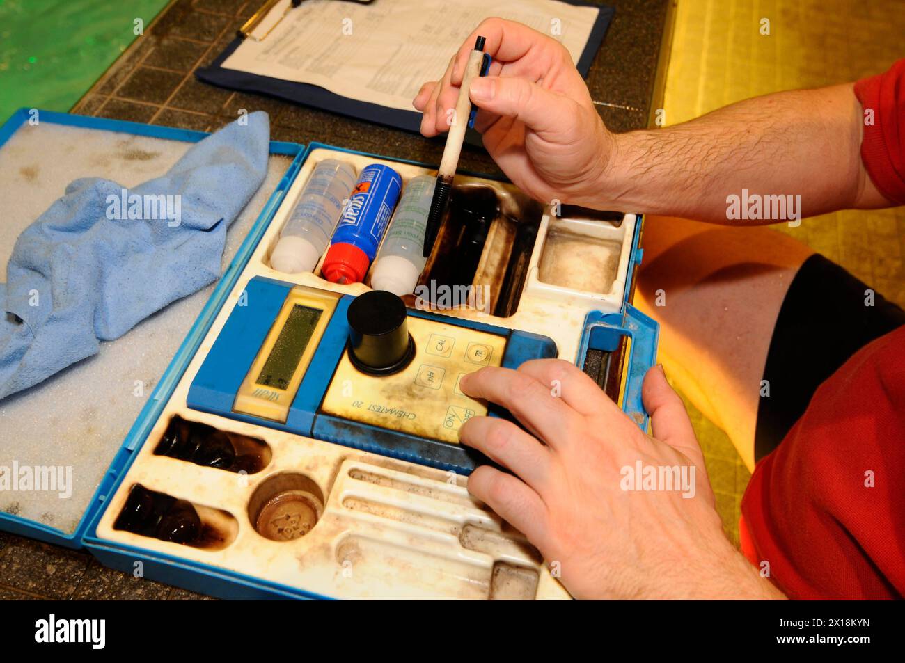 taking a sample to measure and analyse the water quality taking sample ...