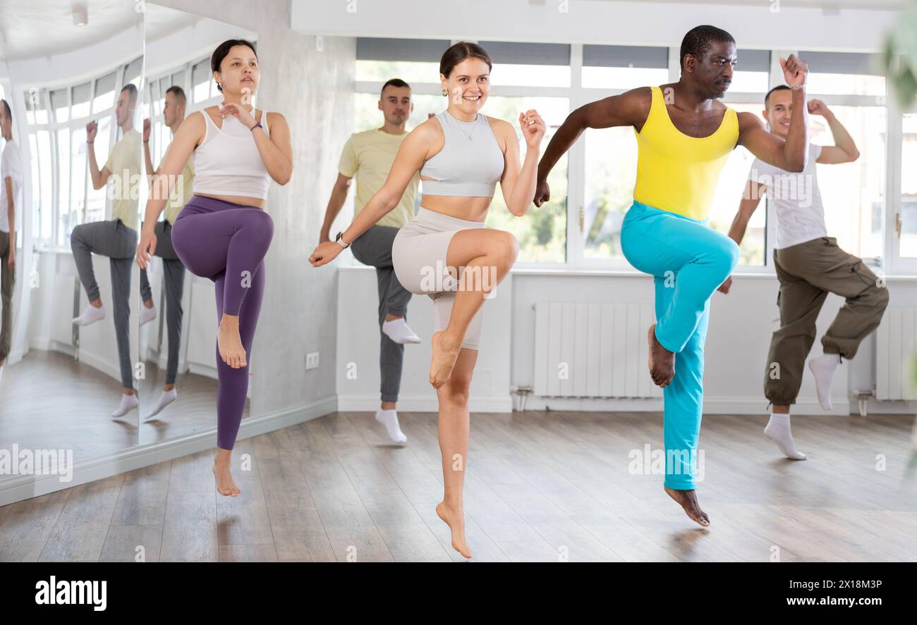 Group of people dancing modern dances Stock Photo - Alamy