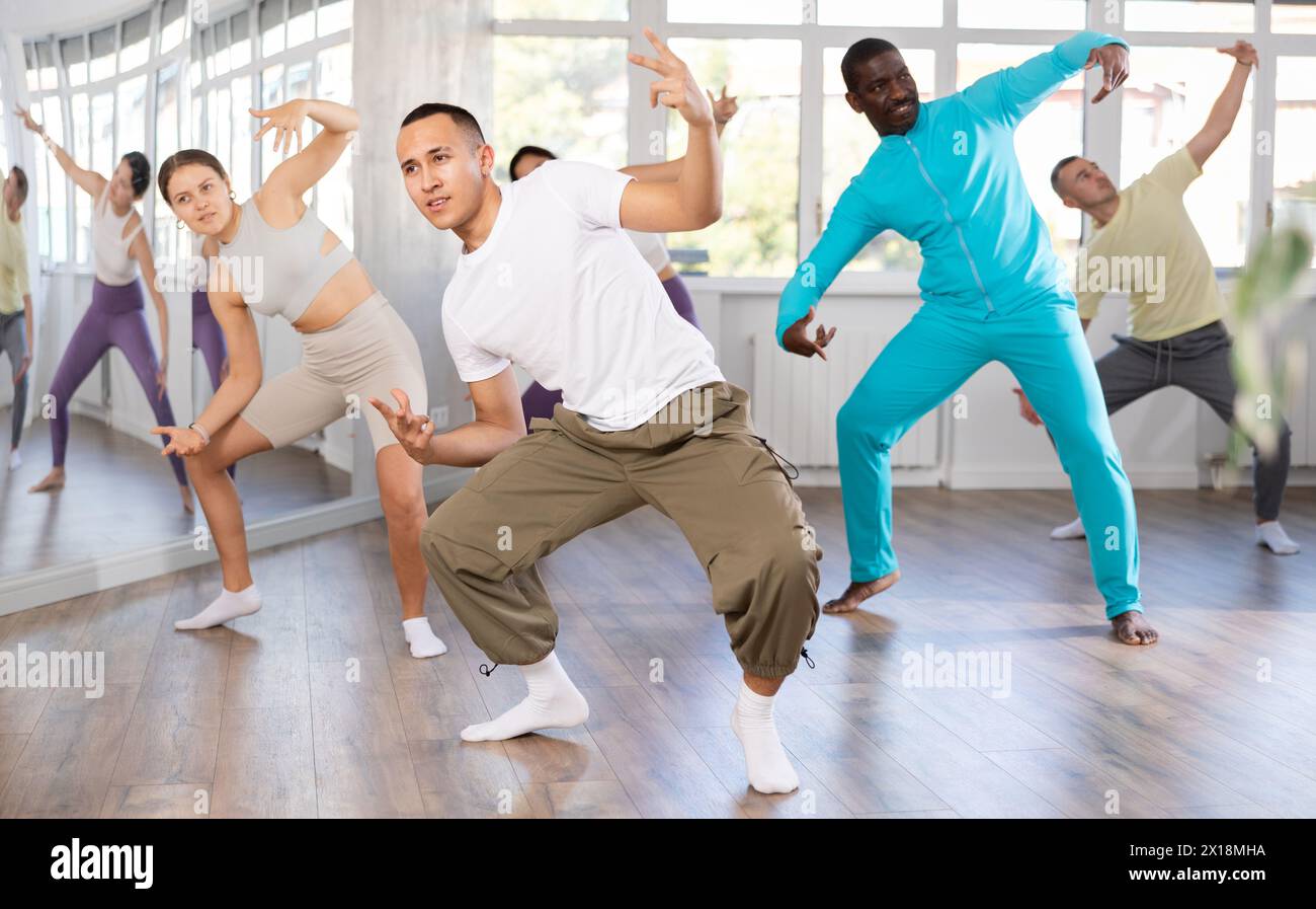 Young Asian man practicing breakdance in training hall Stock Photo - Alamy
