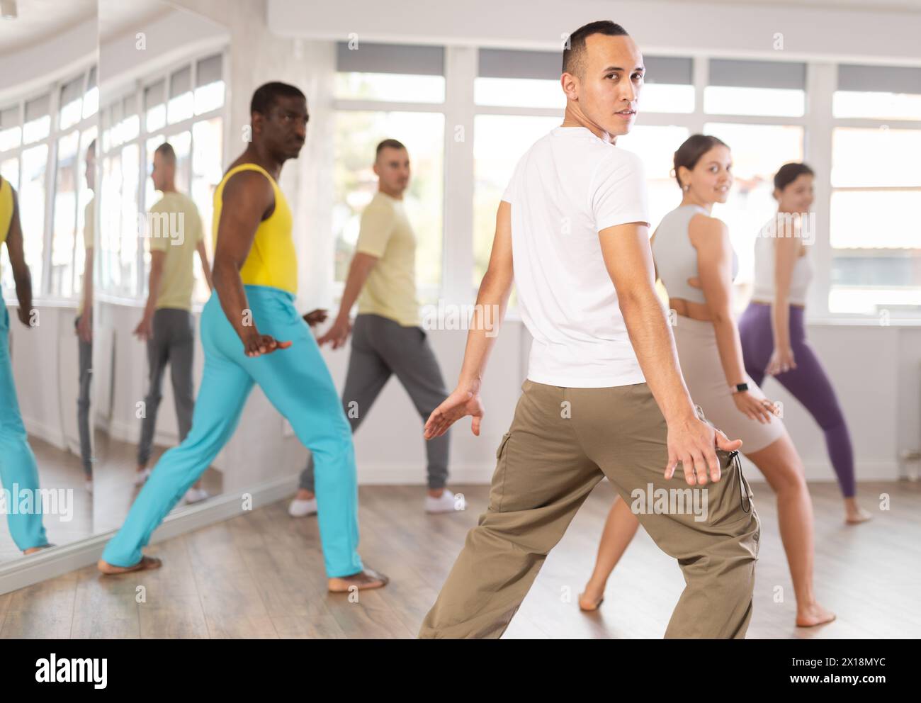 Group of people dancing modern dances Stock Photo - Alamy
