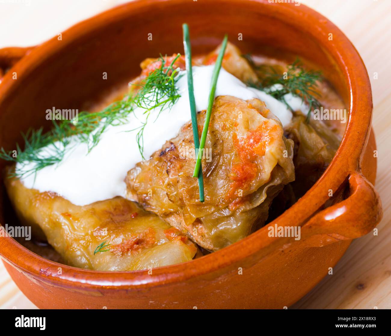 Photography of clay bowl with Sarmi which is cabbage leaves Stock Photo ...
