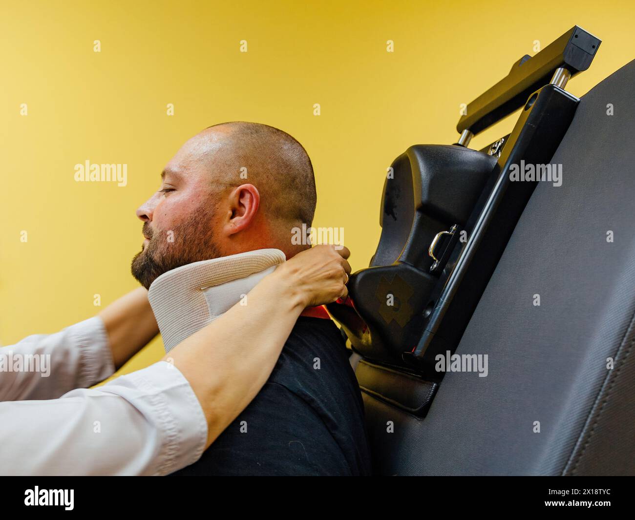 Male patient at non-surgical treatment of cervical and thoracic spine ...