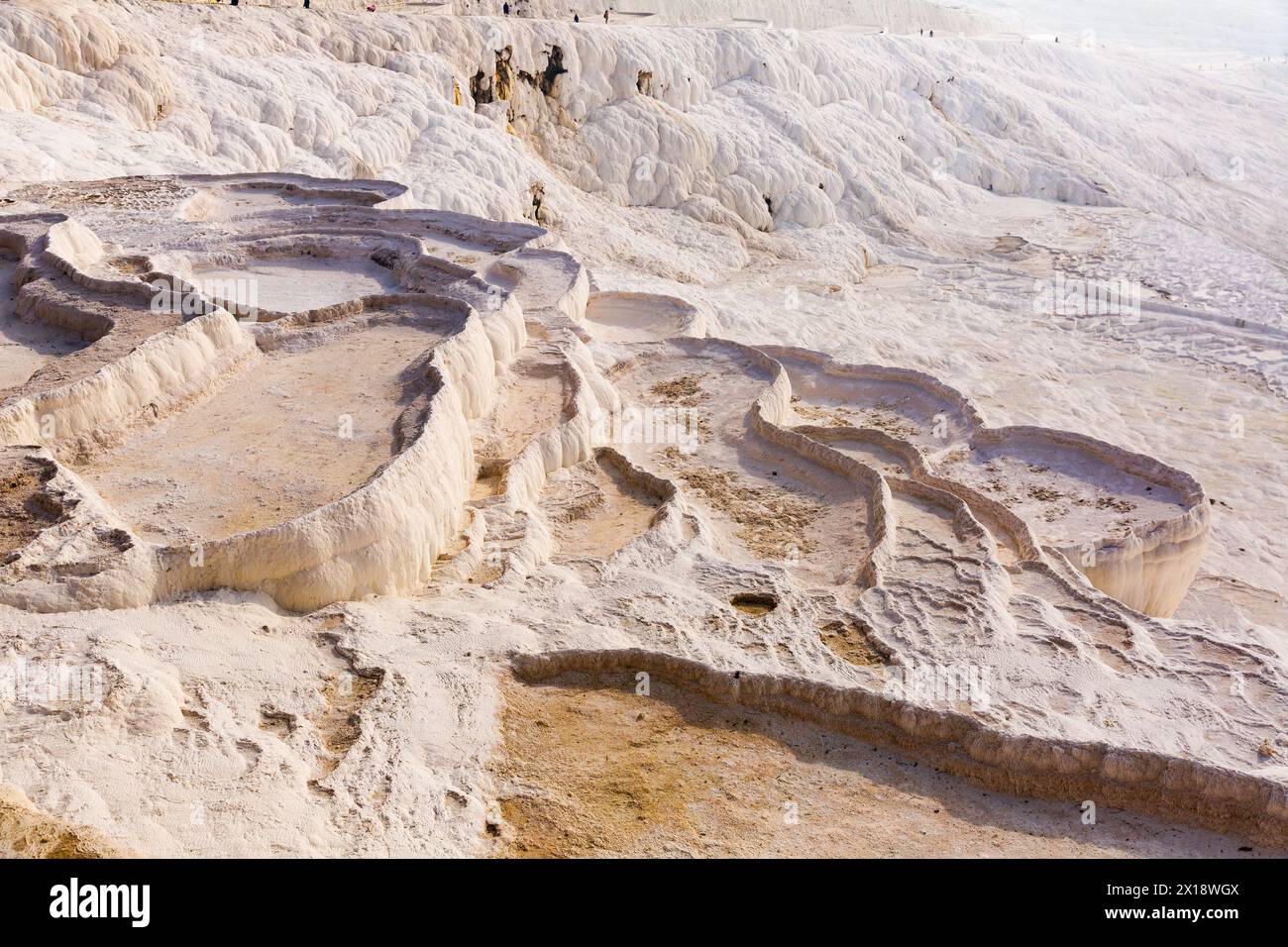 Natural travertine terraces with hot springs in Pamukkale, Turkey Stock ...