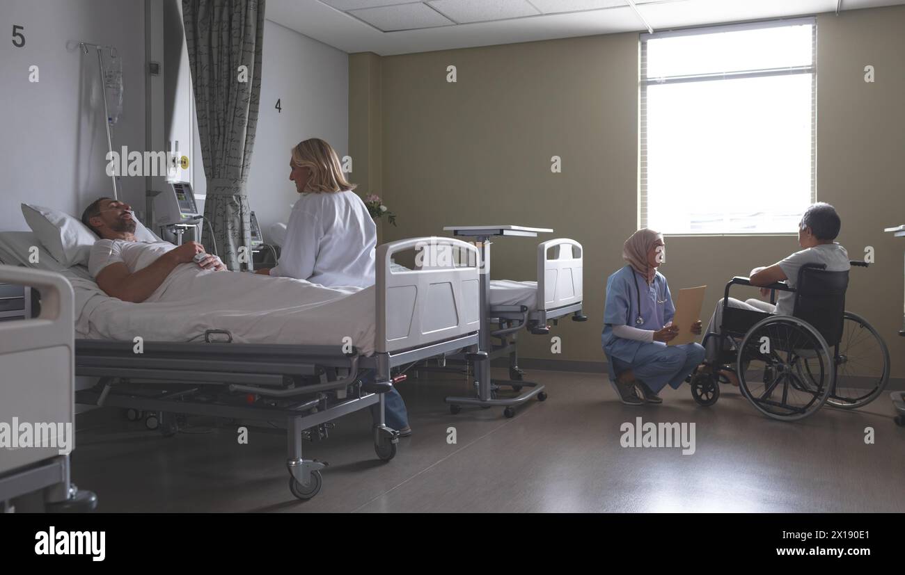 Side view of Caucasian female doctor interacting with Caucasian patient ...