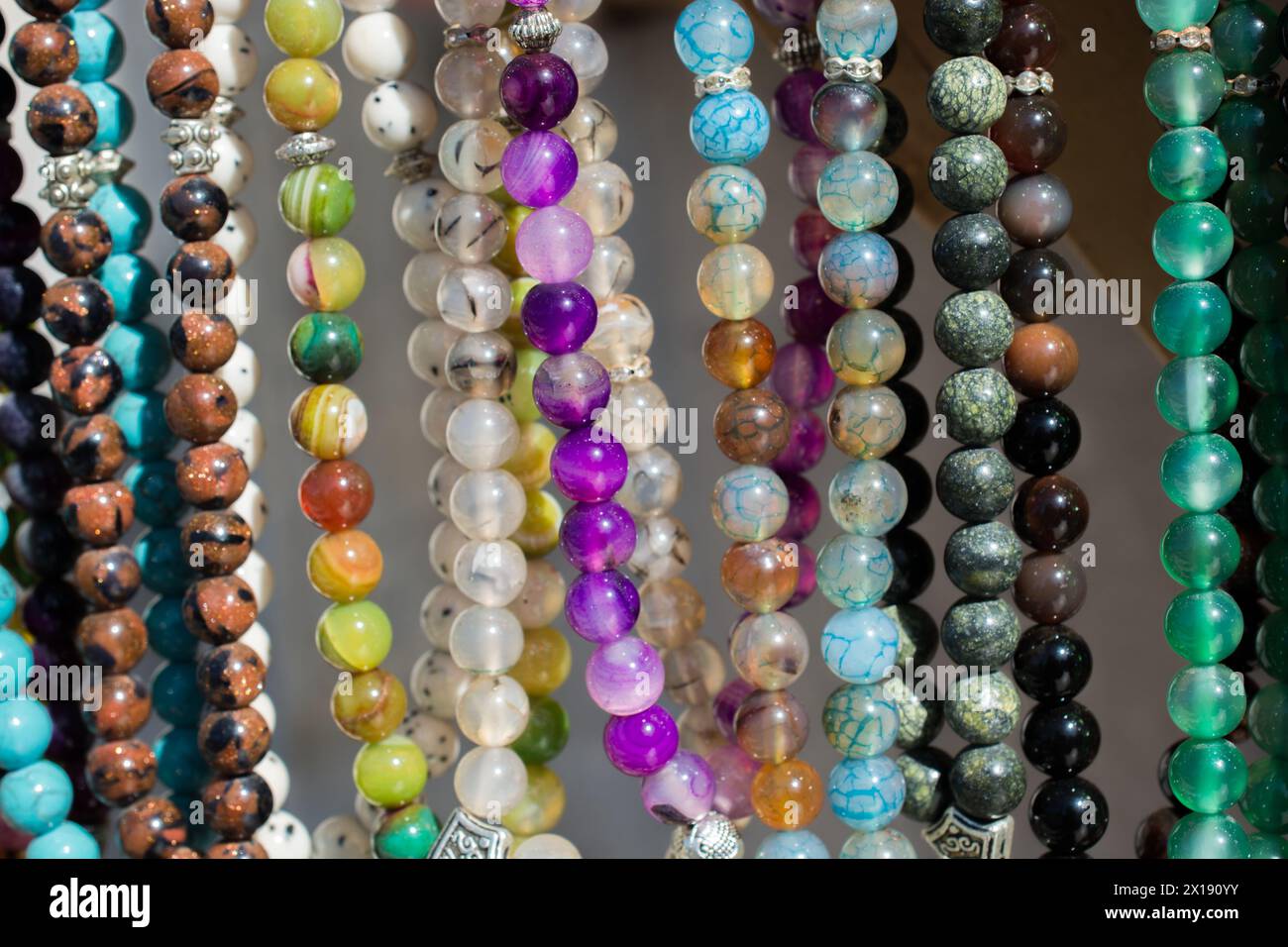 Beautiful colorful beads of various type and color Stock Photo - Alamy