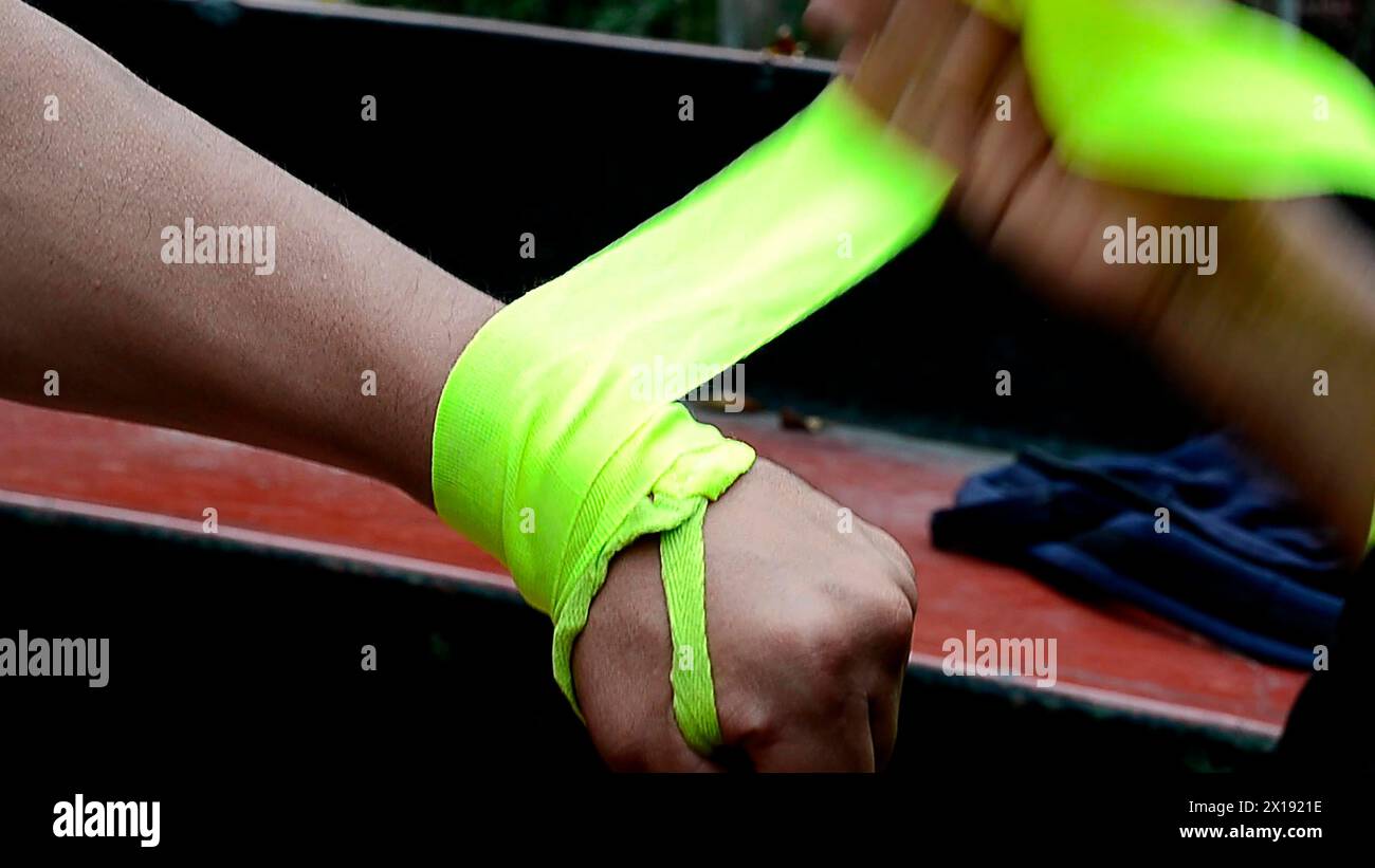 Boxer bandages around their arms ready to fight Stock Photo - Alamy