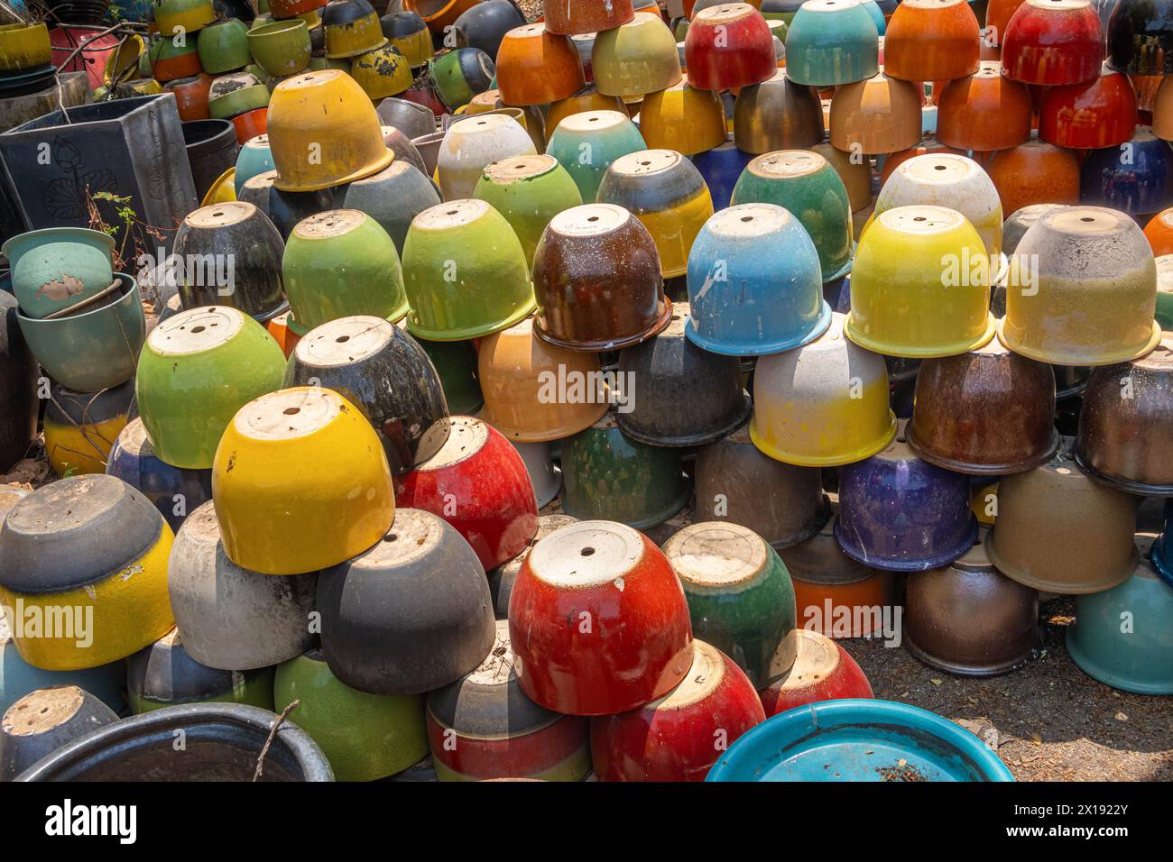 Outdoor storage of colorful flower pots at The Tao Hong Tai Ceramics ...