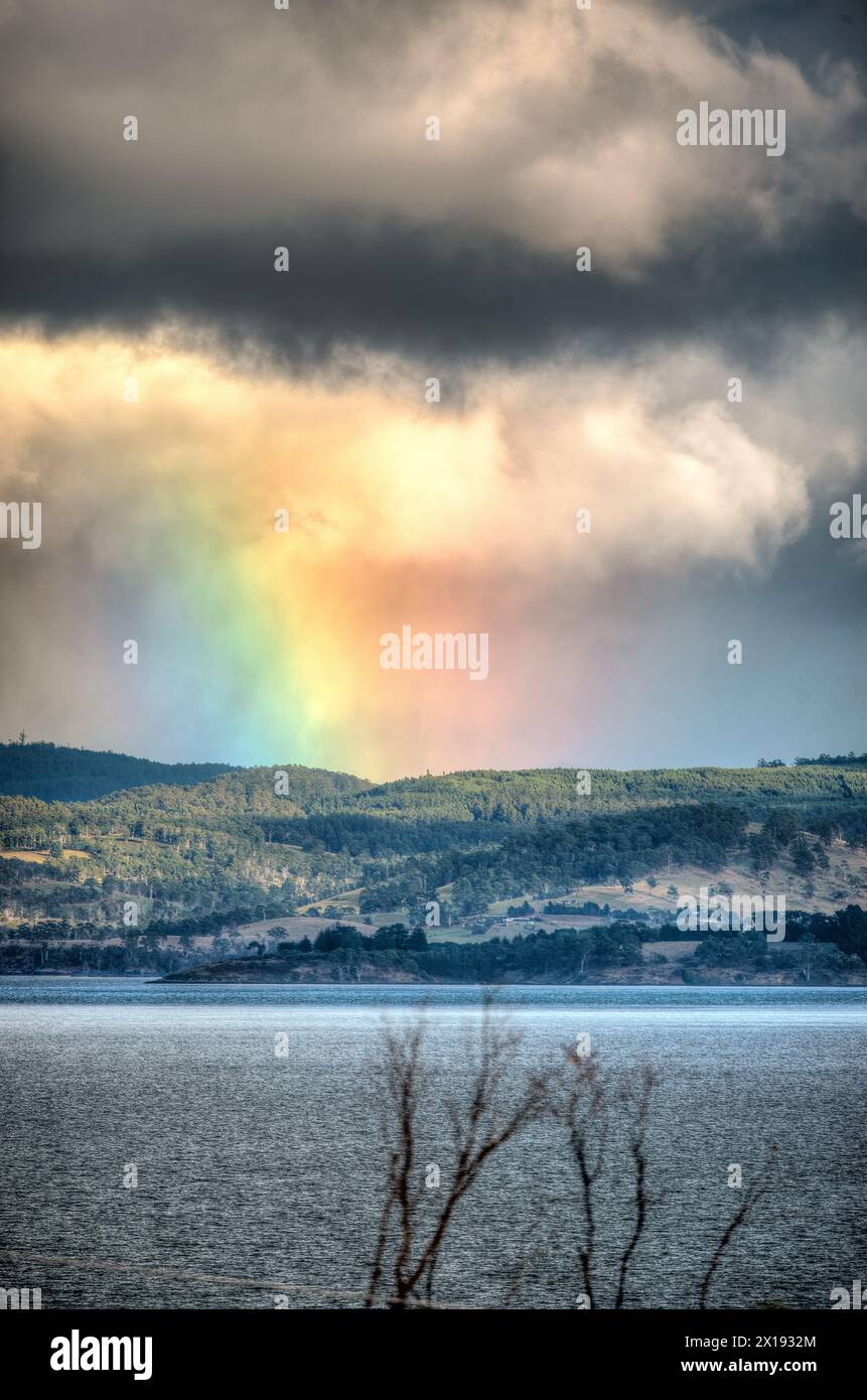 Rainbow over a lake in Bruny Island, Tasmania Stock Photo - Alamy