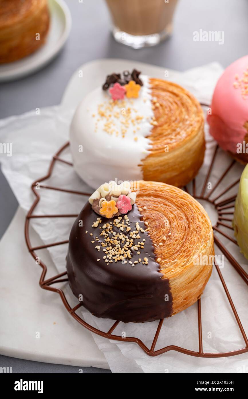 Round croissants with filling and glaze, trendy dessert idea Stock ...