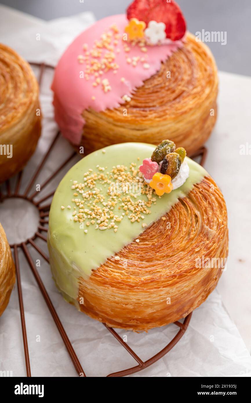 Round croissants with filling and glaze, trendy dessert idea Stock ...