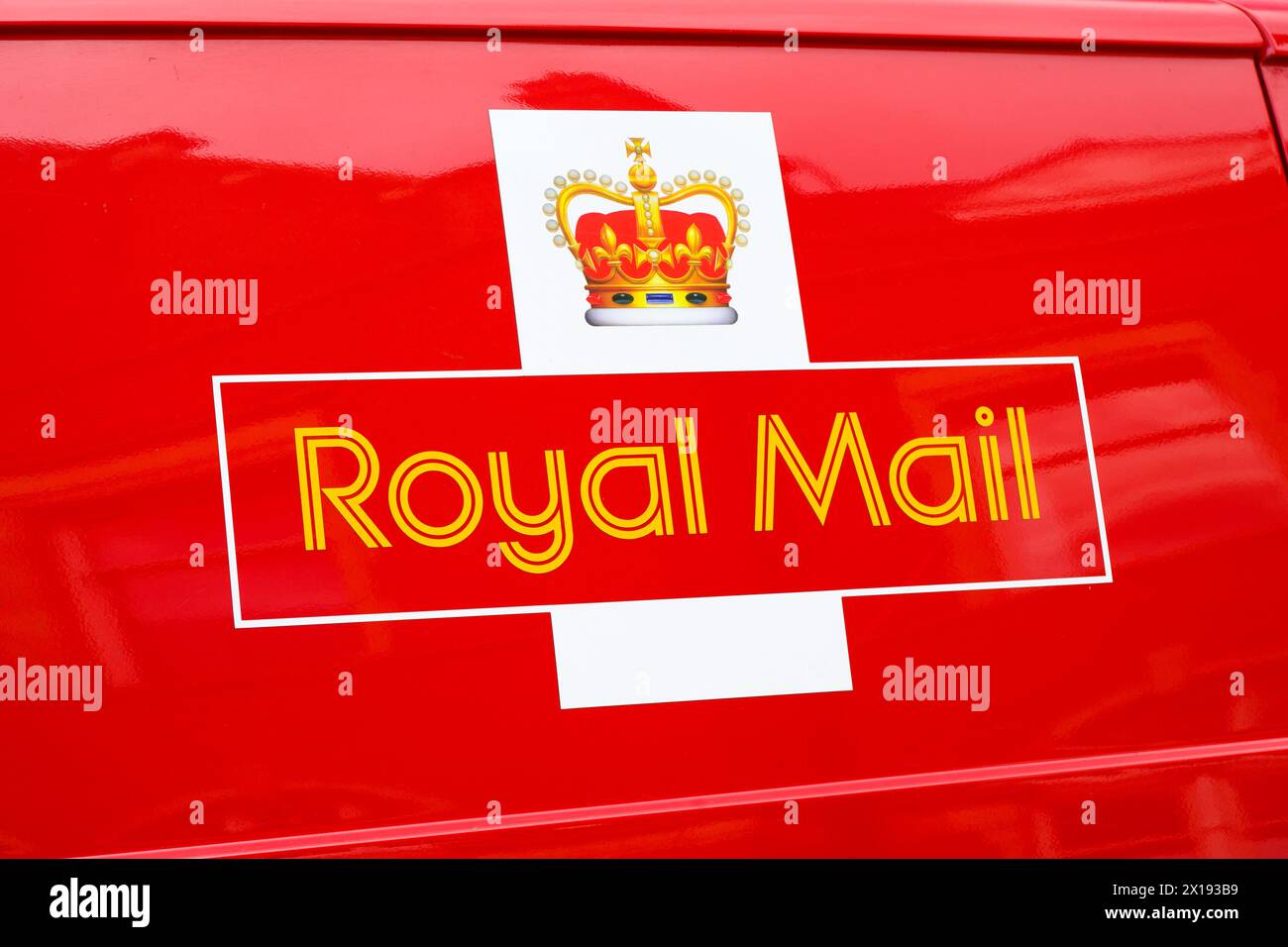 London, UK - March 22, 2024; Royal Mail sign with yellow text and crown ...