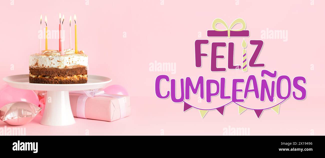 Festive banner with text FELIZ CUMPLEANOS (Spanish for Happy Birthday ...