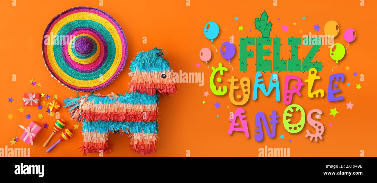 Festive banner with text FELIZ CUMPLEANOS (Spanish for Happy Birthday ...