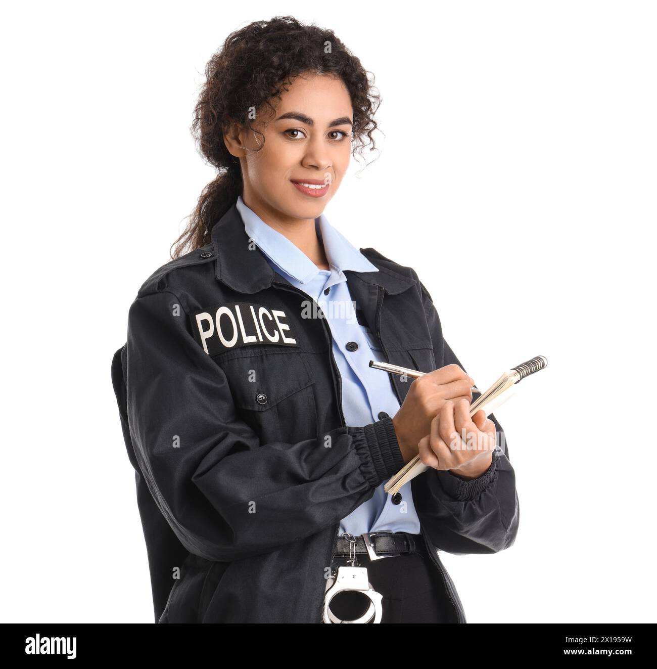 African-American female police officer with notebook on white ...