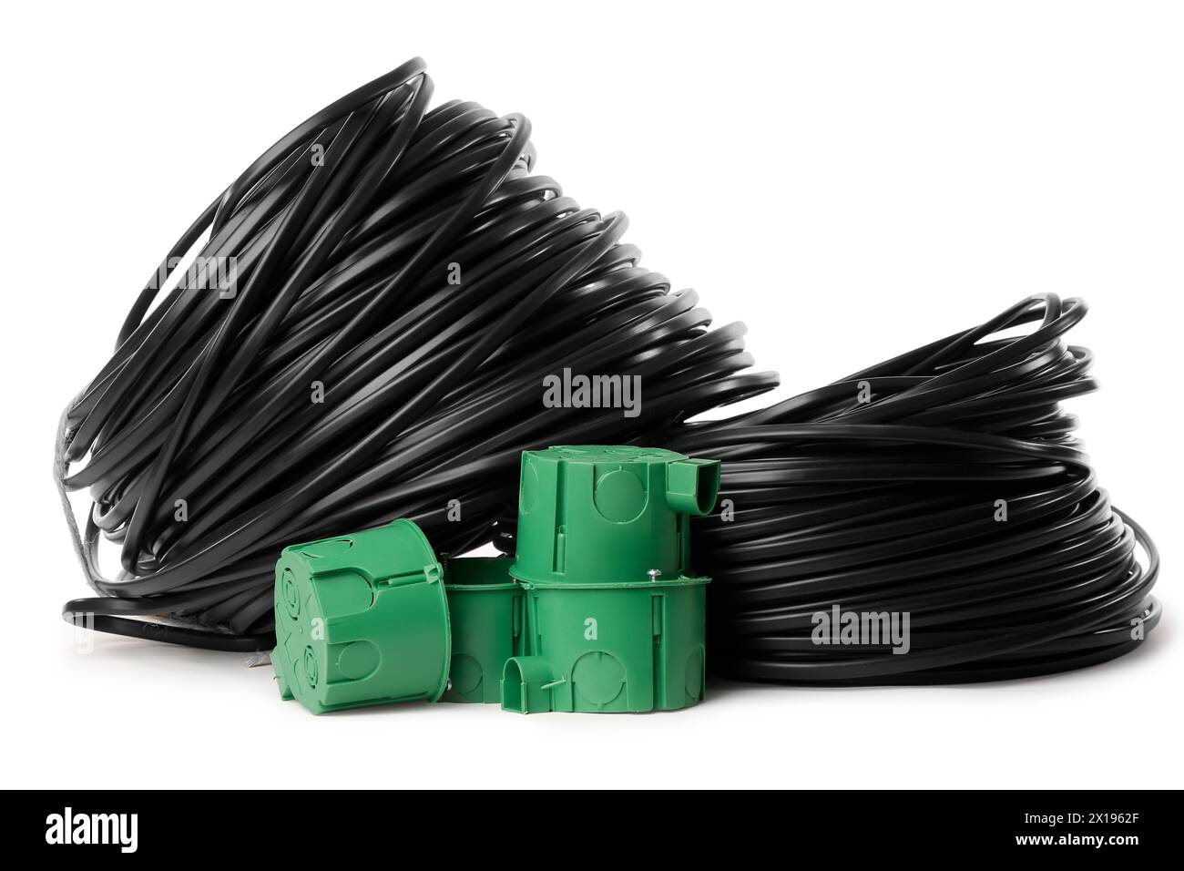 Rolled cables and socket mounting boxes on white background Stock Photo ...