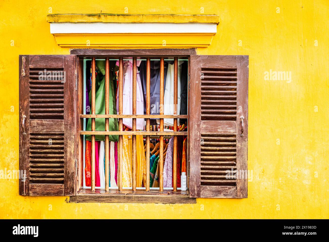 Close-up image of a window of a clothing store in the town of Hoi An ...