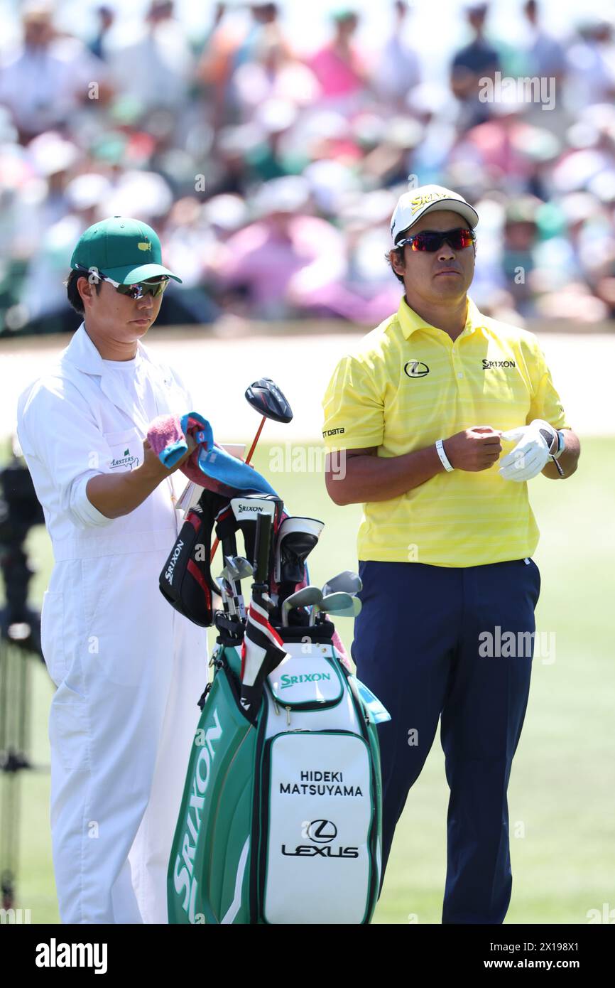 Japan's Hideki Matsuyama and his caddie Shota Hayafuji on the 3rd hole ...