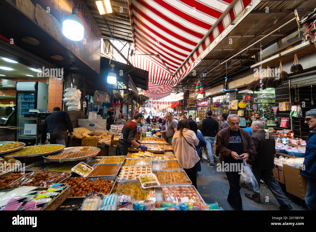 Amman, Jordan - March 14 2023: People shops in the traditional Souq Al ...