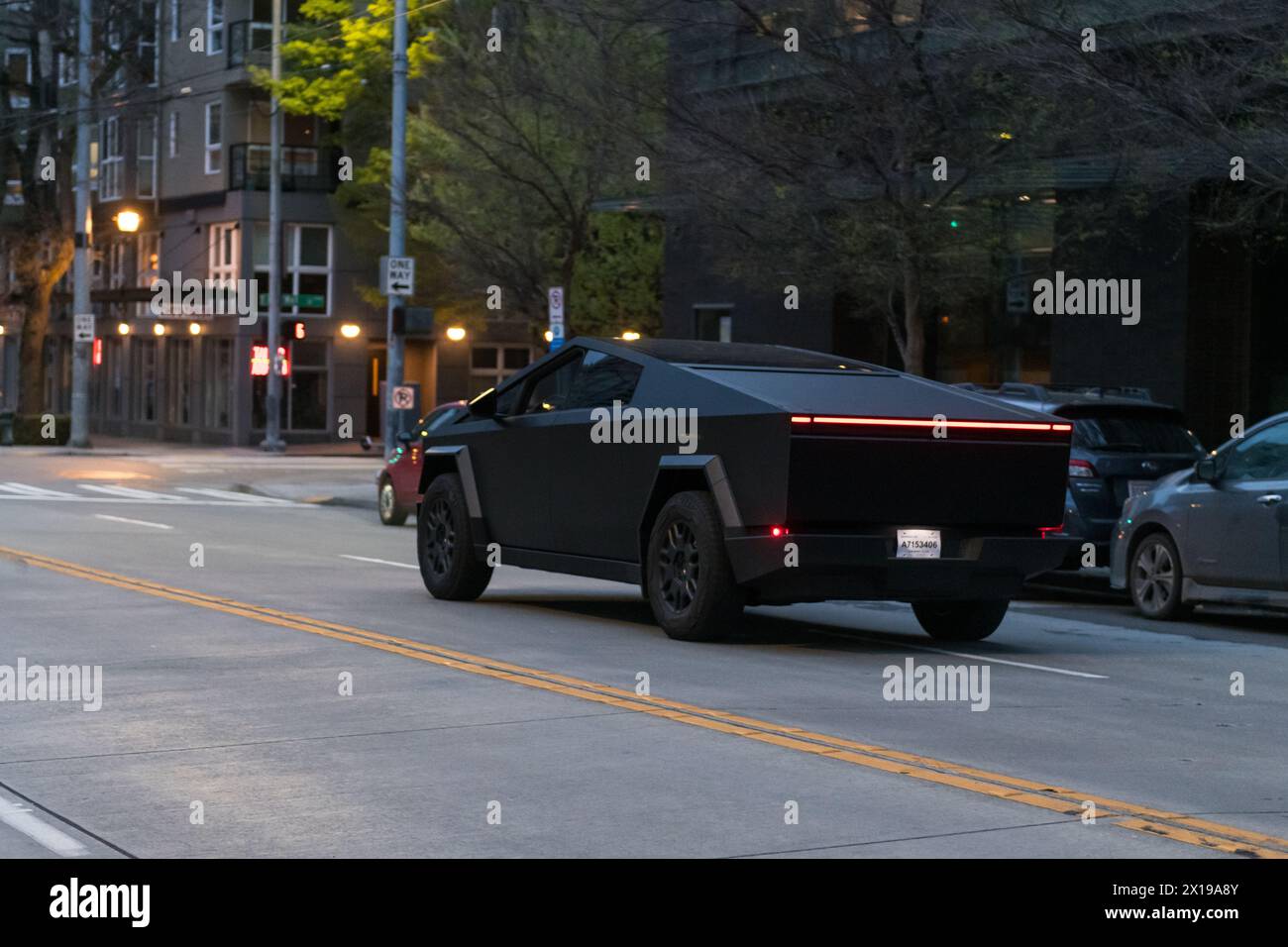 Seattle, USA. 15 Apr, 2024. A matte black wrapped Tesla Cybertruck on ...