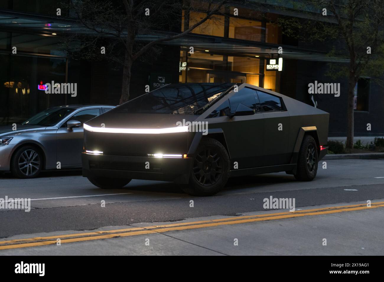 Seattle, USA. 15 Apr, 2024. A matte black wrapped Tesla Cybertruck on ...