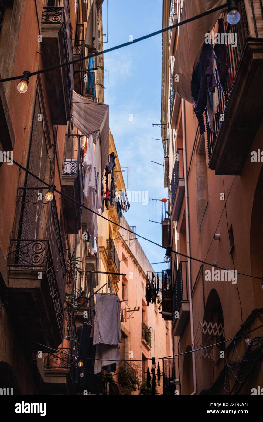 Narrow street in the Gothic Quarter, Barcelona, Spain, with laundry ...