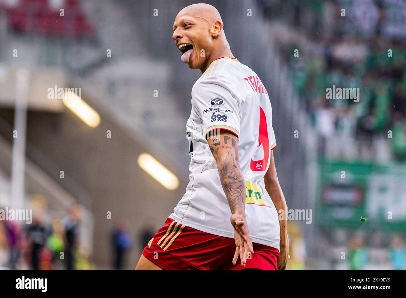 Lodz, Poland. 14th Apr, 2024. Kay Tejan of LKS celebrates a goal during ...