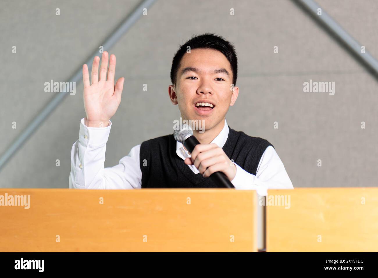 Leadership communication sitting microphone the media hi-res stock ...