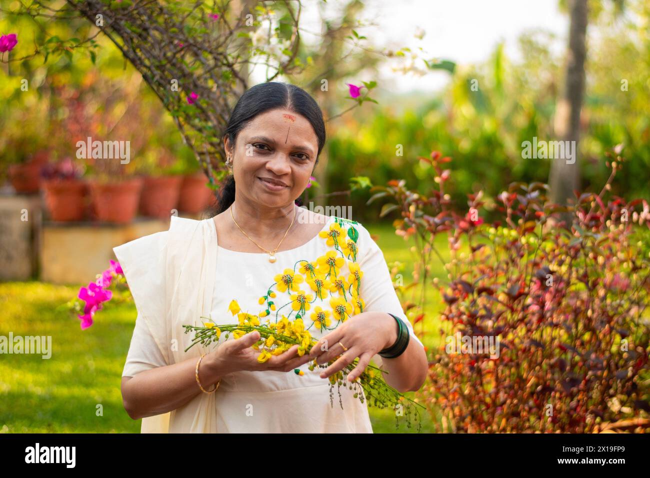 A Picture of middle aged malayali woman wearing a traditional kerala ...