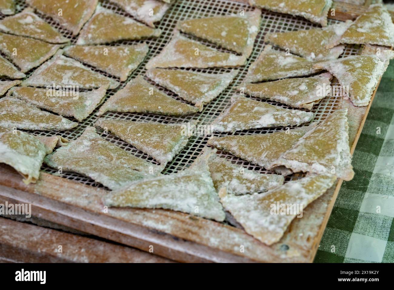 Italian food, fresh homemade pasta filled with spinach ravioli ready to ...