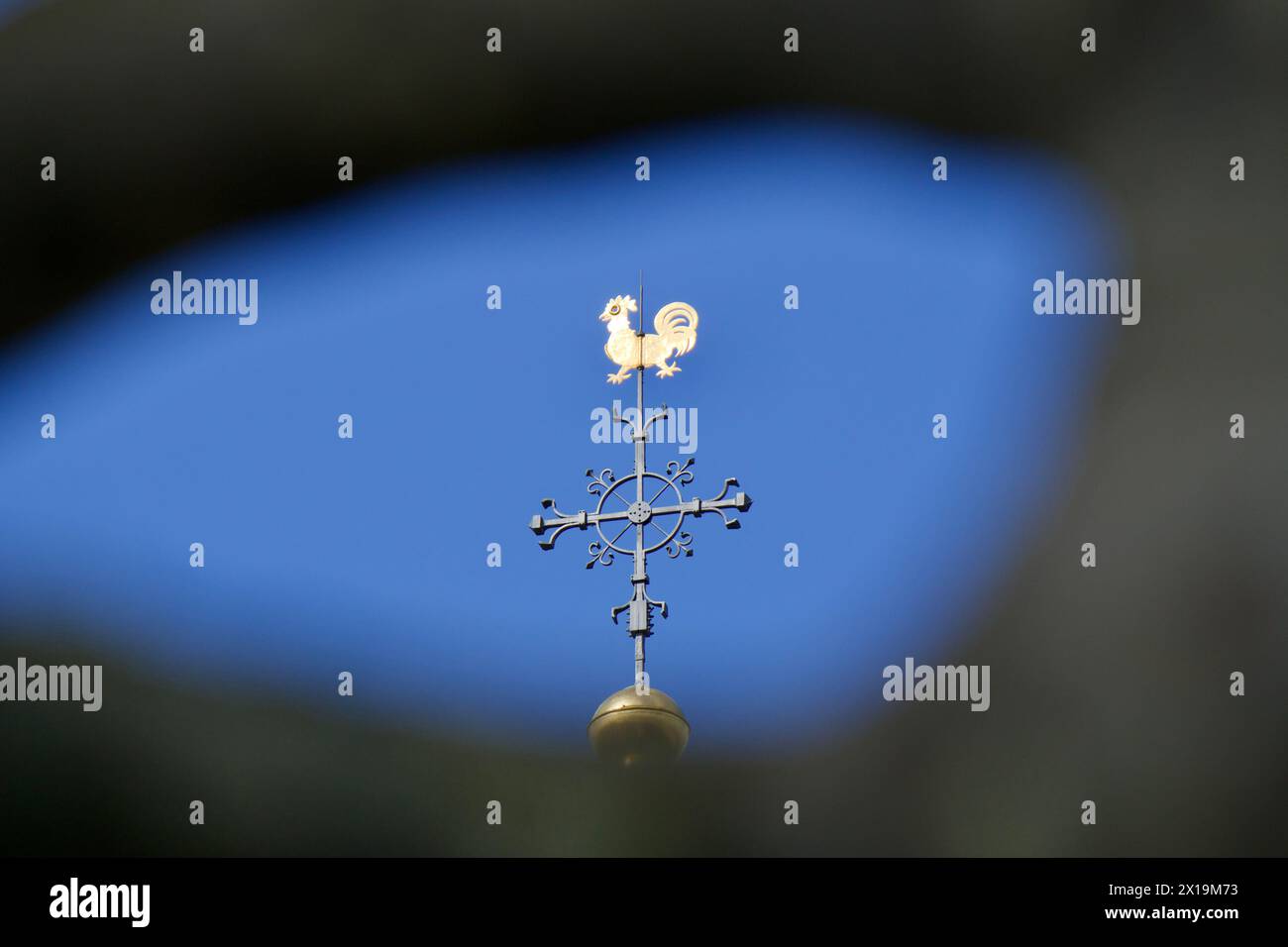 Frankfurt, Germany, April 10, 2024. A rooster on top of a cross on top ...