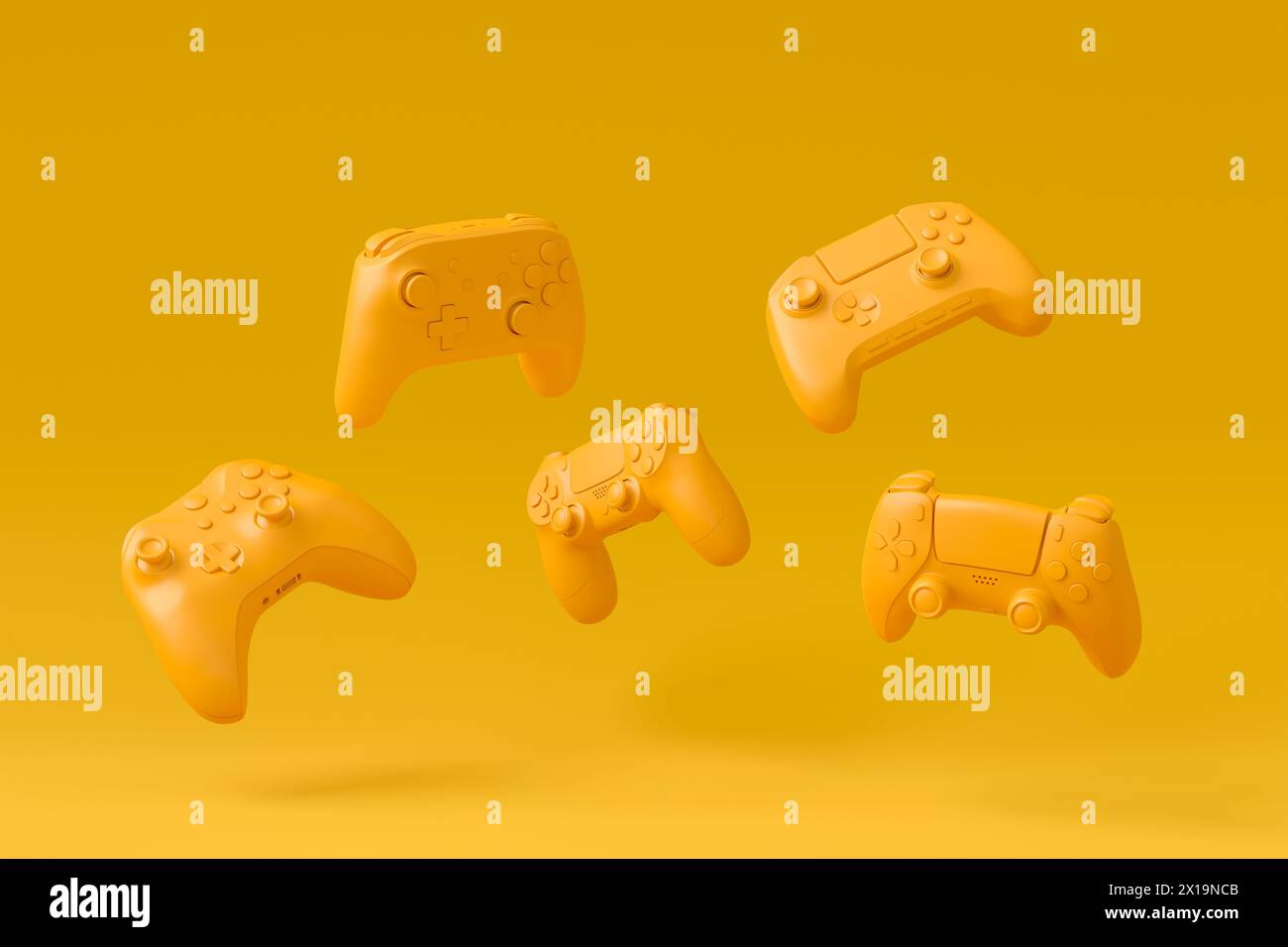 Set of flying gamer joysticks or gamepads on monochrome background. 3d ...