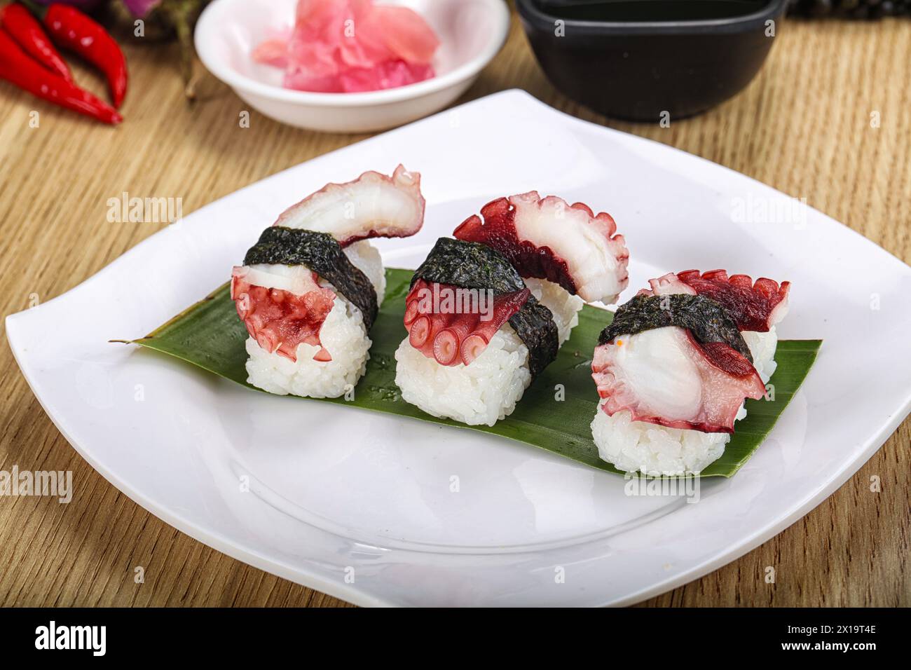 Japanese cuisine - sushi with octopus served ginger Stock Photo - Alamy