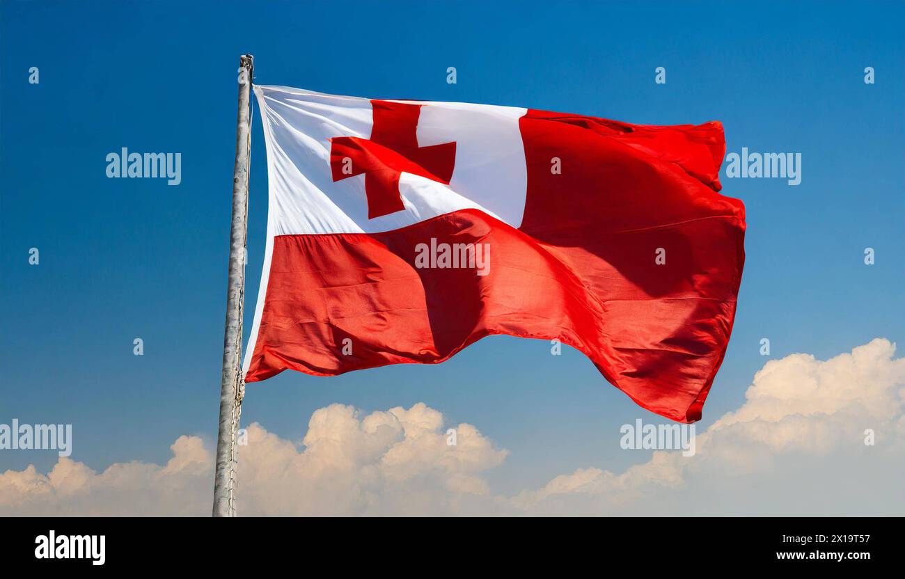 Die Fahne von Tonga, flattert im Wind, isoliert, gegen den blauen ...