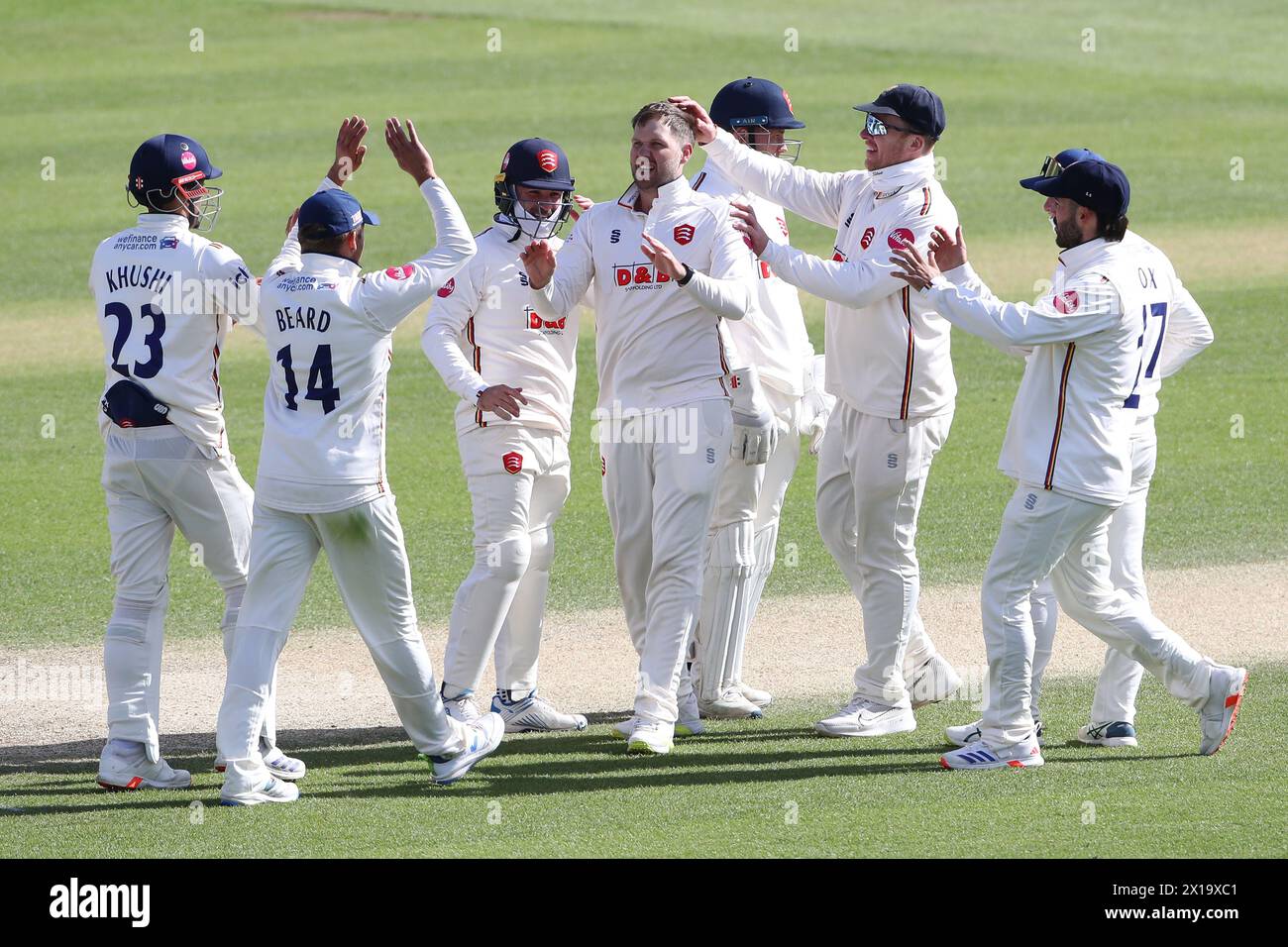 Matt Critchley of Essex celebrates with his team mates after taking the ...