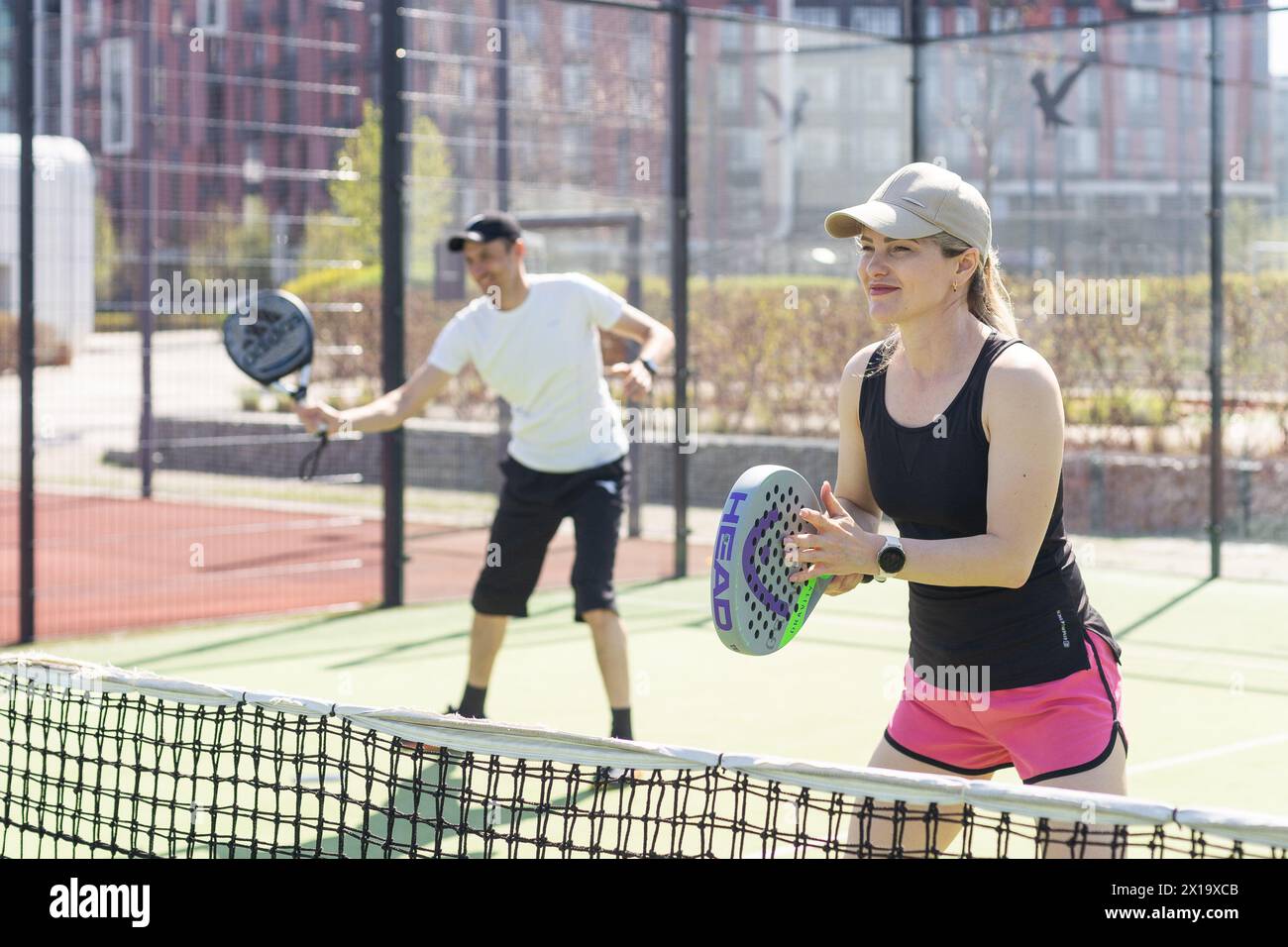 Ukraine Kyiv, April 02 2024. Happy athletic couple having fun while ...
