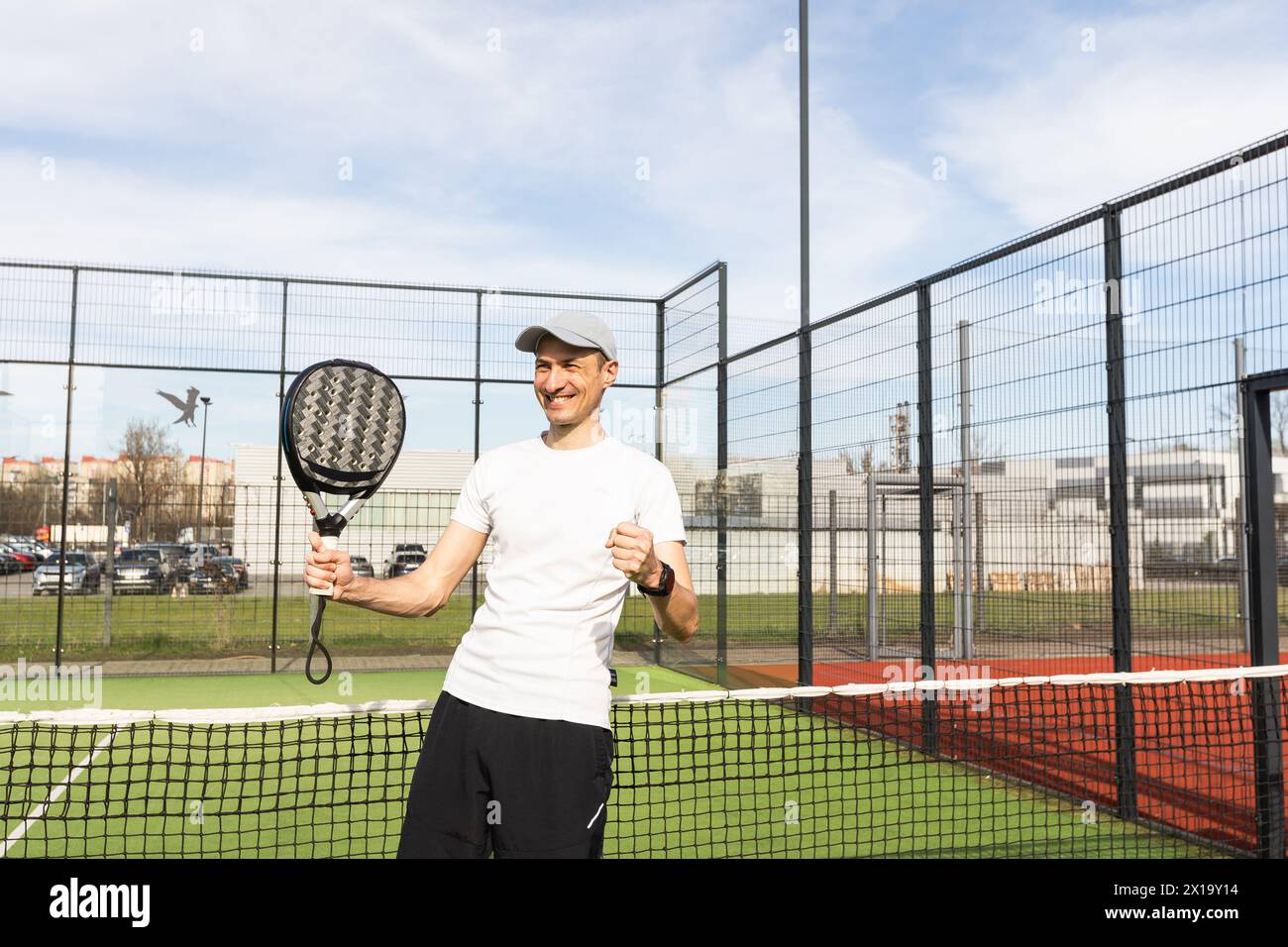 Padel match in a grass padel court - Padel player playing a match Stock ...