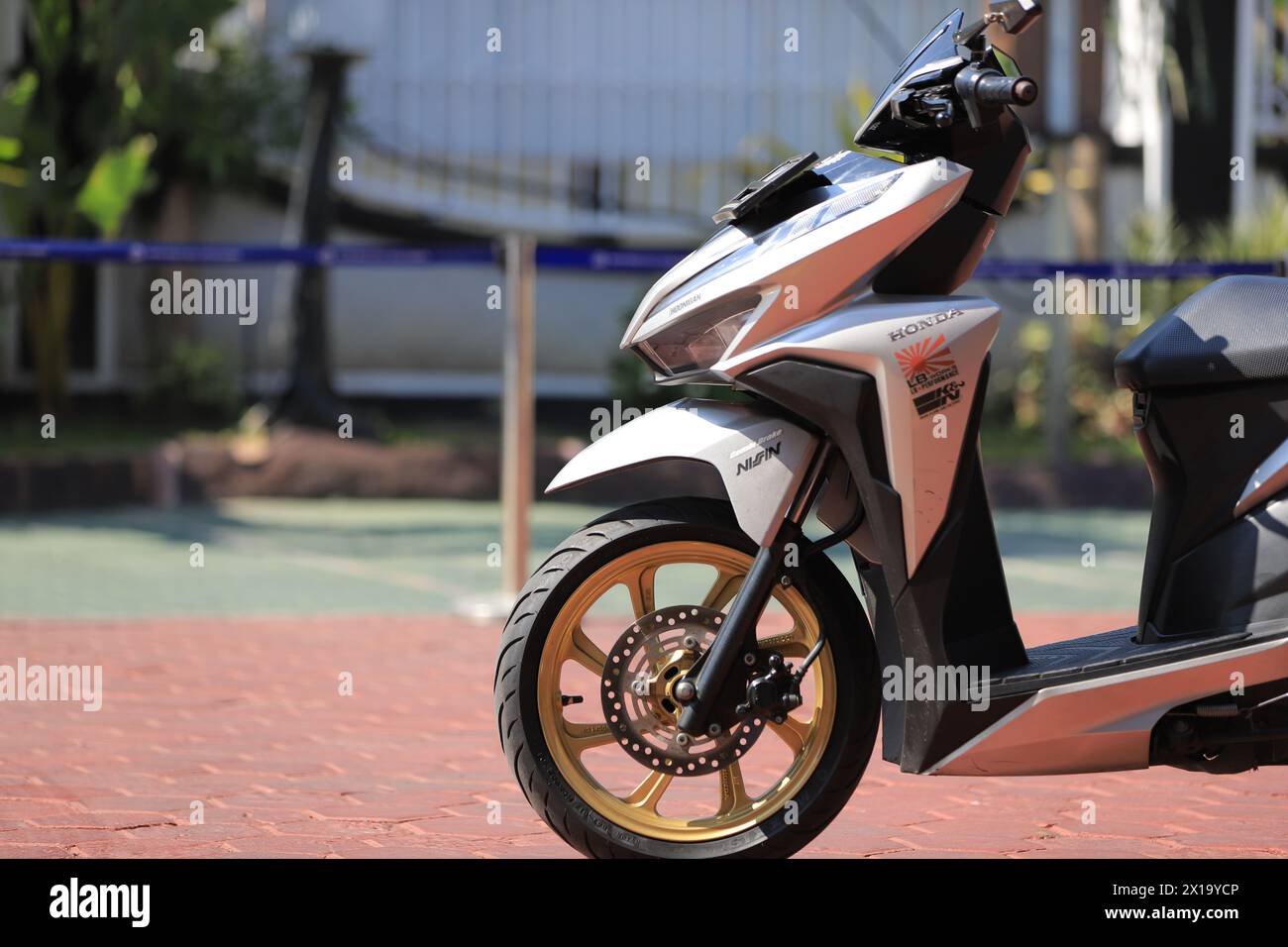 Honda Vario brand motorcycle parked in the yard Stock Photo - Alamy