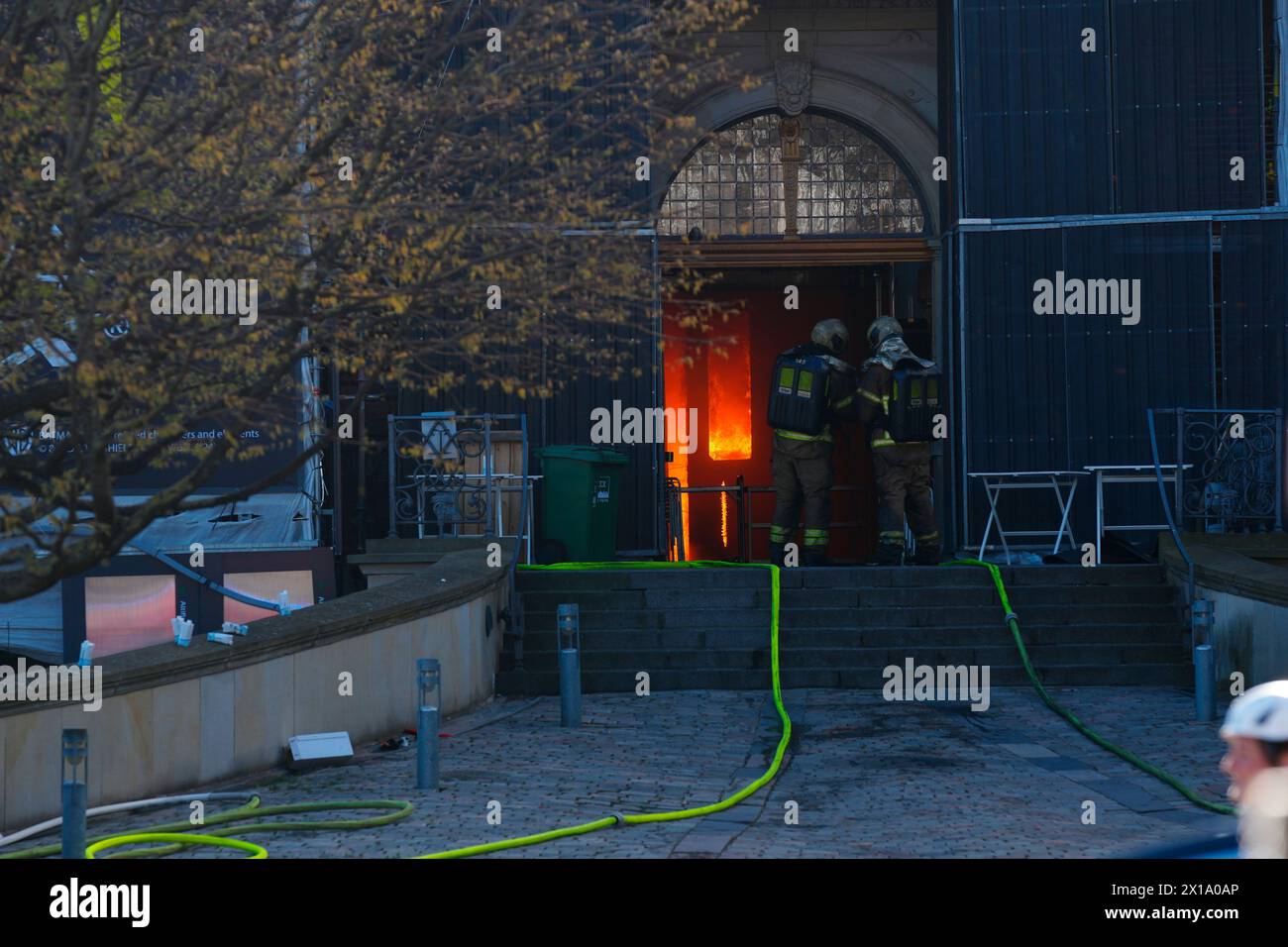 Firefighters at the main entrance as the historic building Boersen is ...