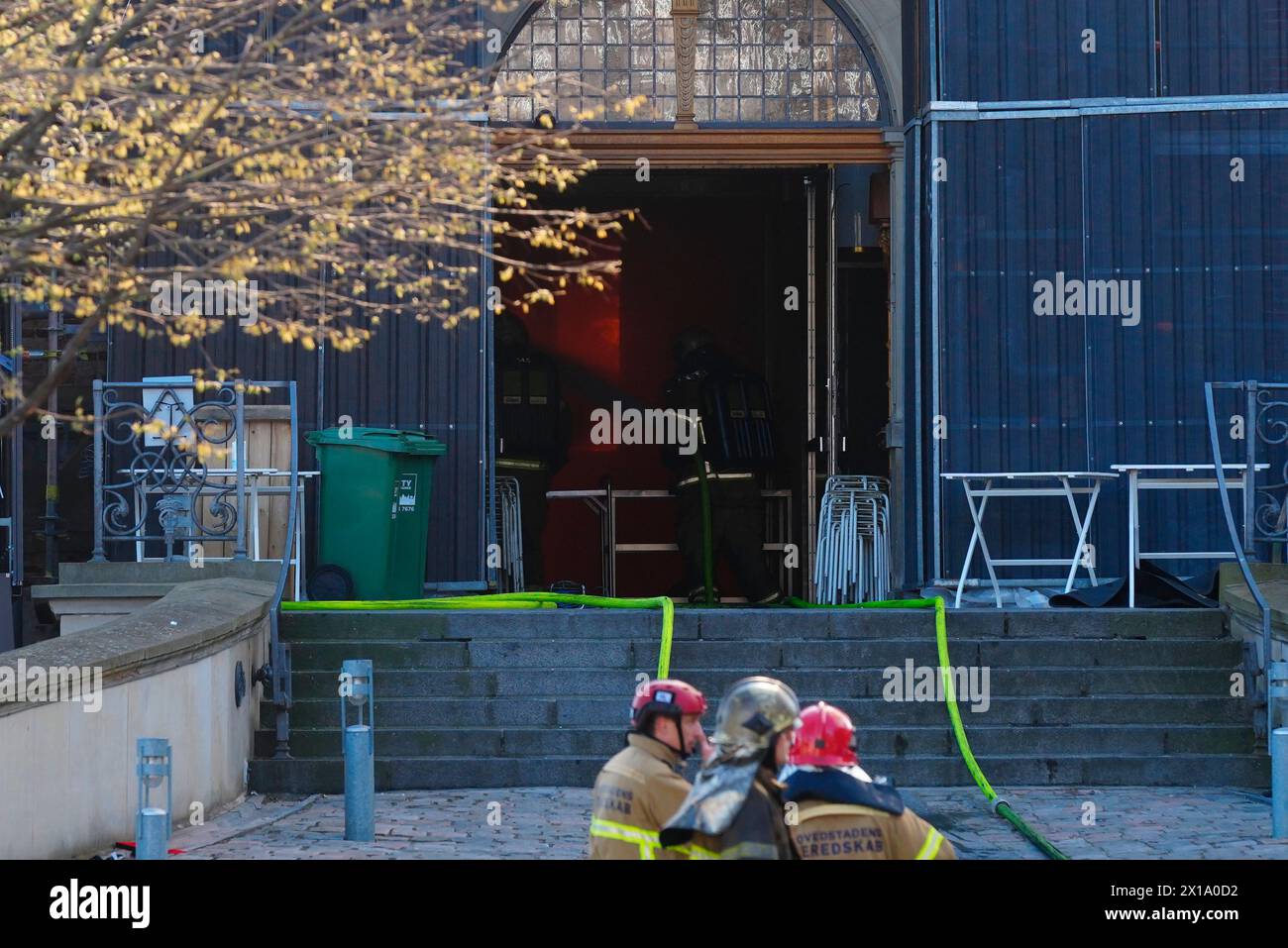 Firefighters at the main entrance as the historic building Boersen is ...