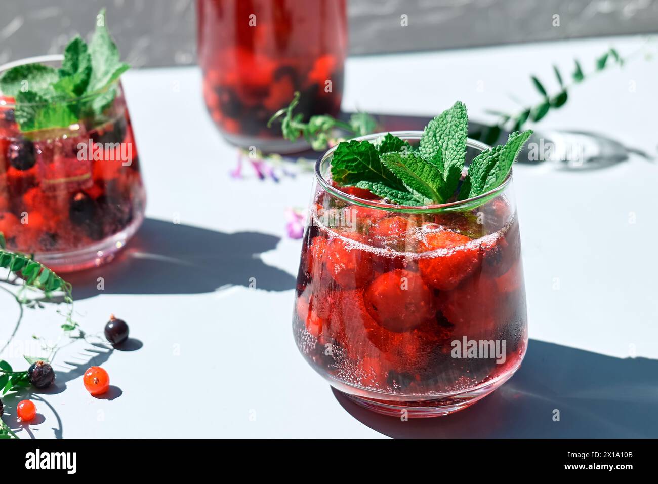 Berry refreshing cold summer drink. Cocktail or mocktail with ripe ...