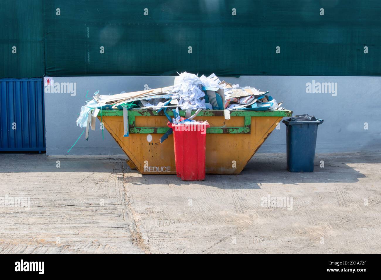 recycle paper separation in the metal bin outdoors in front of the ...